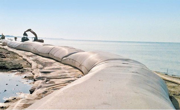 Flood Risk Management with Geotextile and Geotube Technology